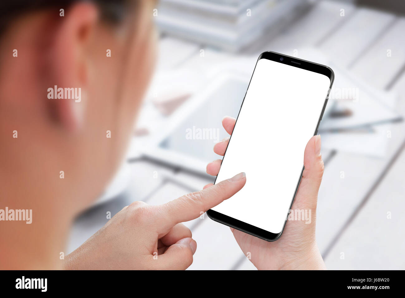 Mobile phone in woman hand. Left hand touch display. Isolated screen ...