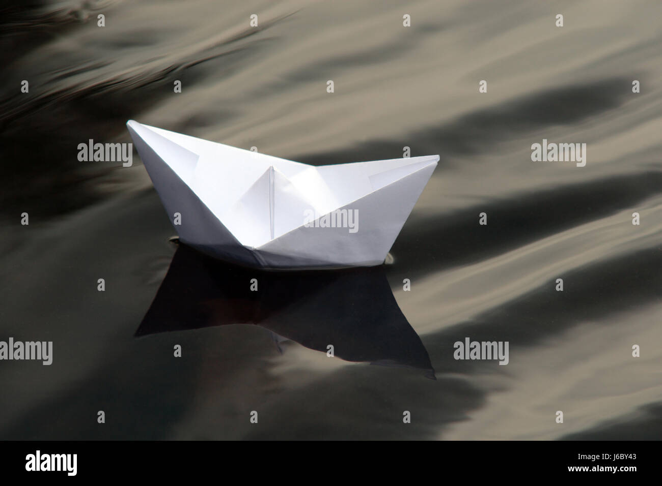 Kids playing paper boats hi-res stock photography and images - Alamy