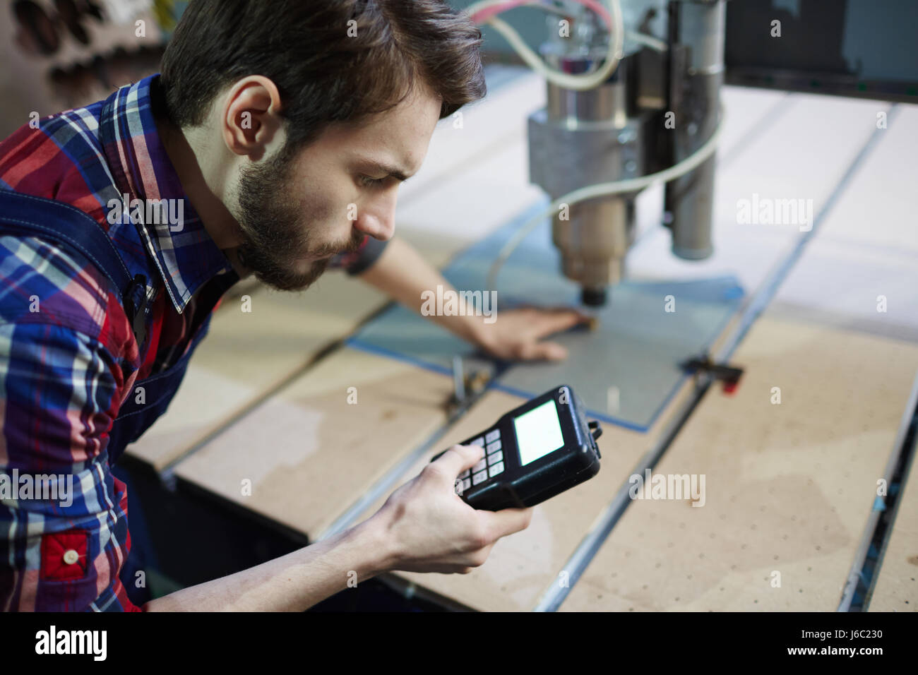 Glass cutting machine hi-res stock photography and images - Alamy