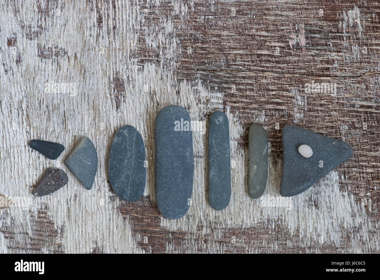 fish from pebbles Stock Photo - Alamy
