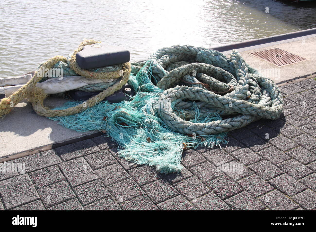 mooring with ropes Stock Photo - Alamy