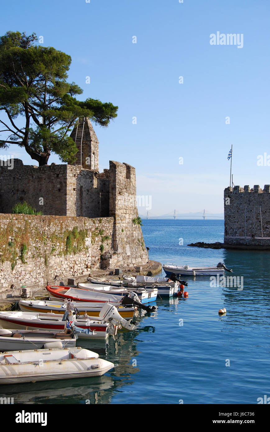 greece harbor harbours port entrance historical tree bridge greece ...