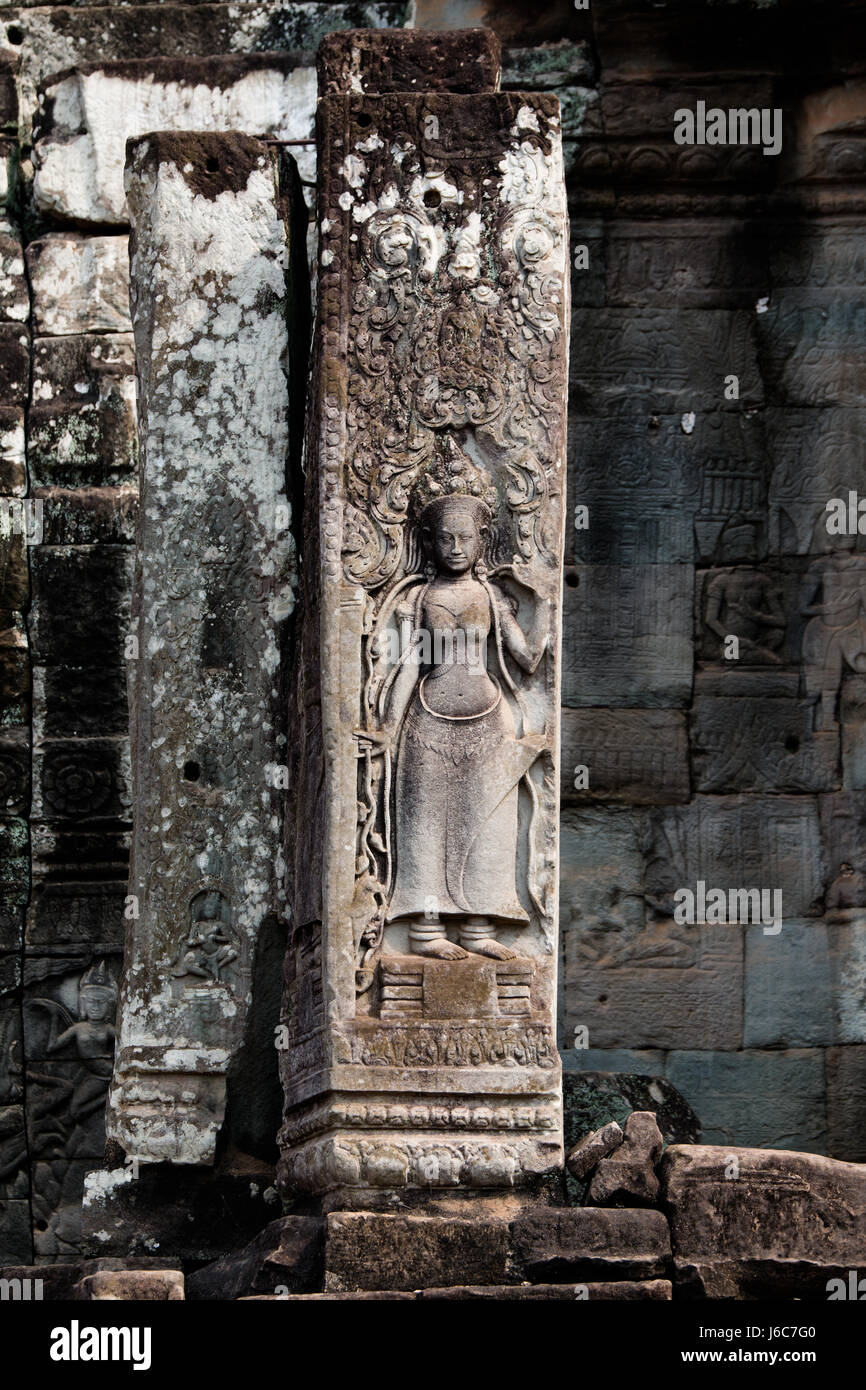 Full size stone bass relief of an apsara, heavenly nymph, at the Bayon ...