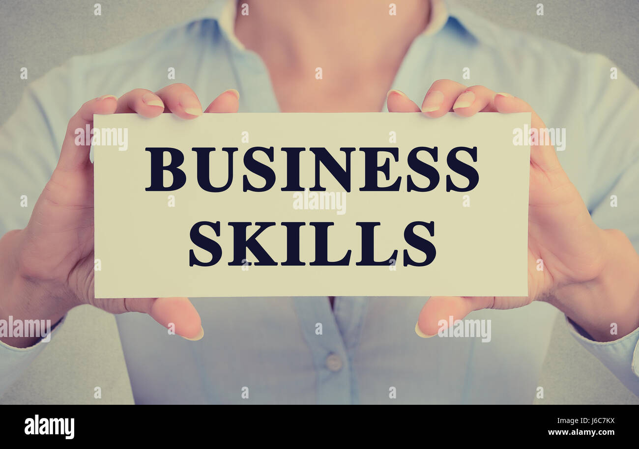 Closeup businesswoman hands holding white card sign with business ...