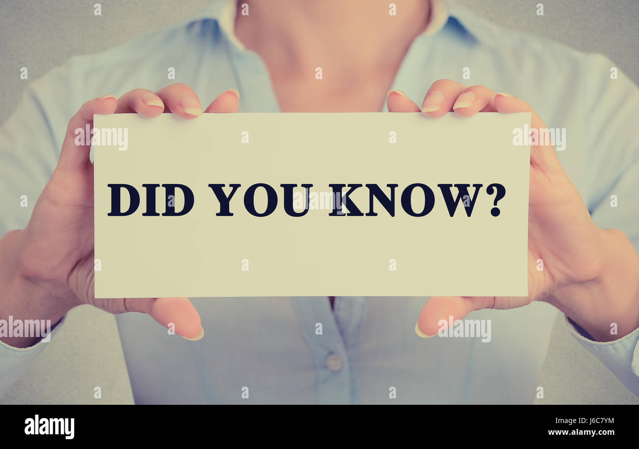 Closeup businesswoman hands holding white card sign with Did You Know ...
