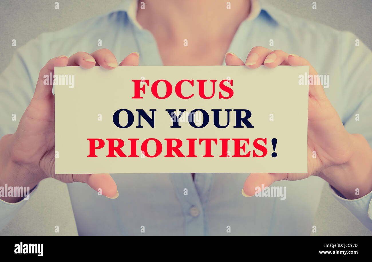 Businesswoman hands holding white card sign with focus on your ...
