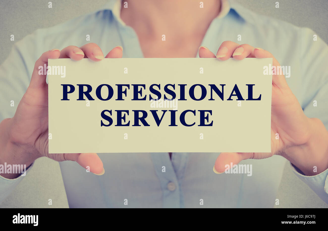 Closeup businesswoman hands holding Professional service sign card ...