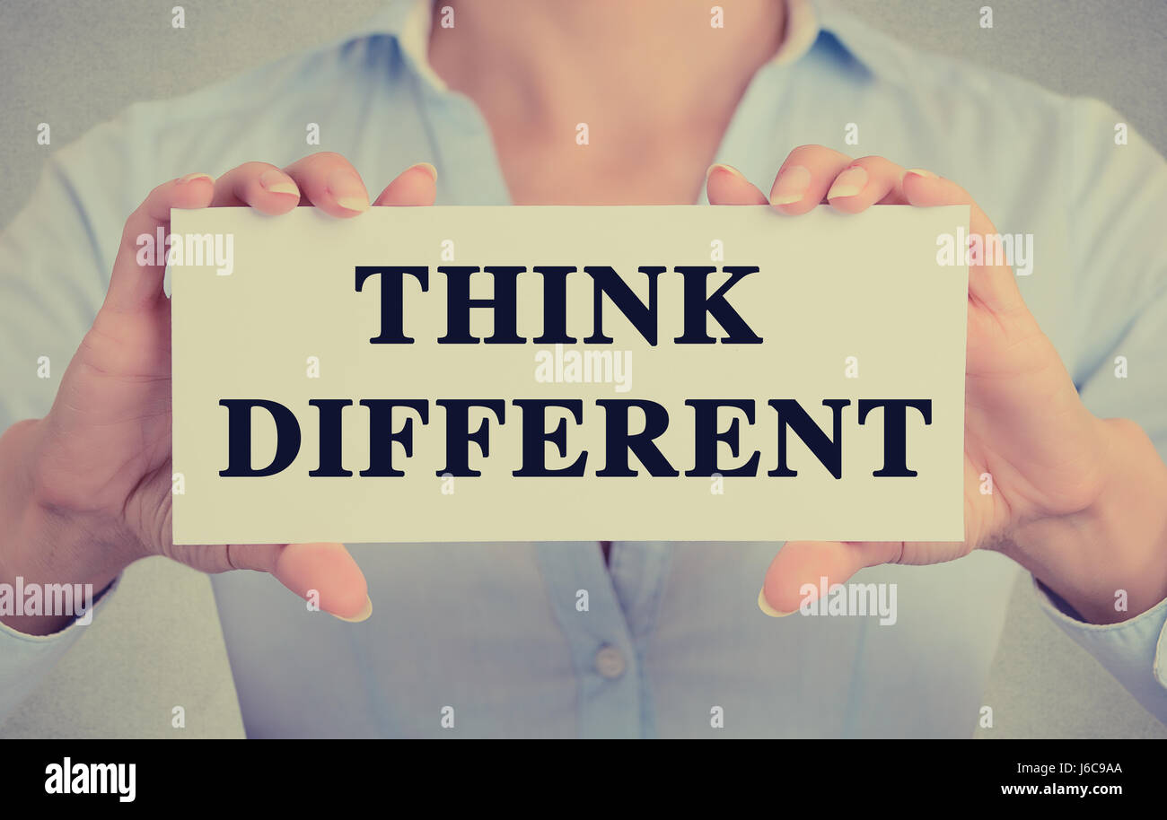 Closeup businesswoman hands holding white card sign with think ...