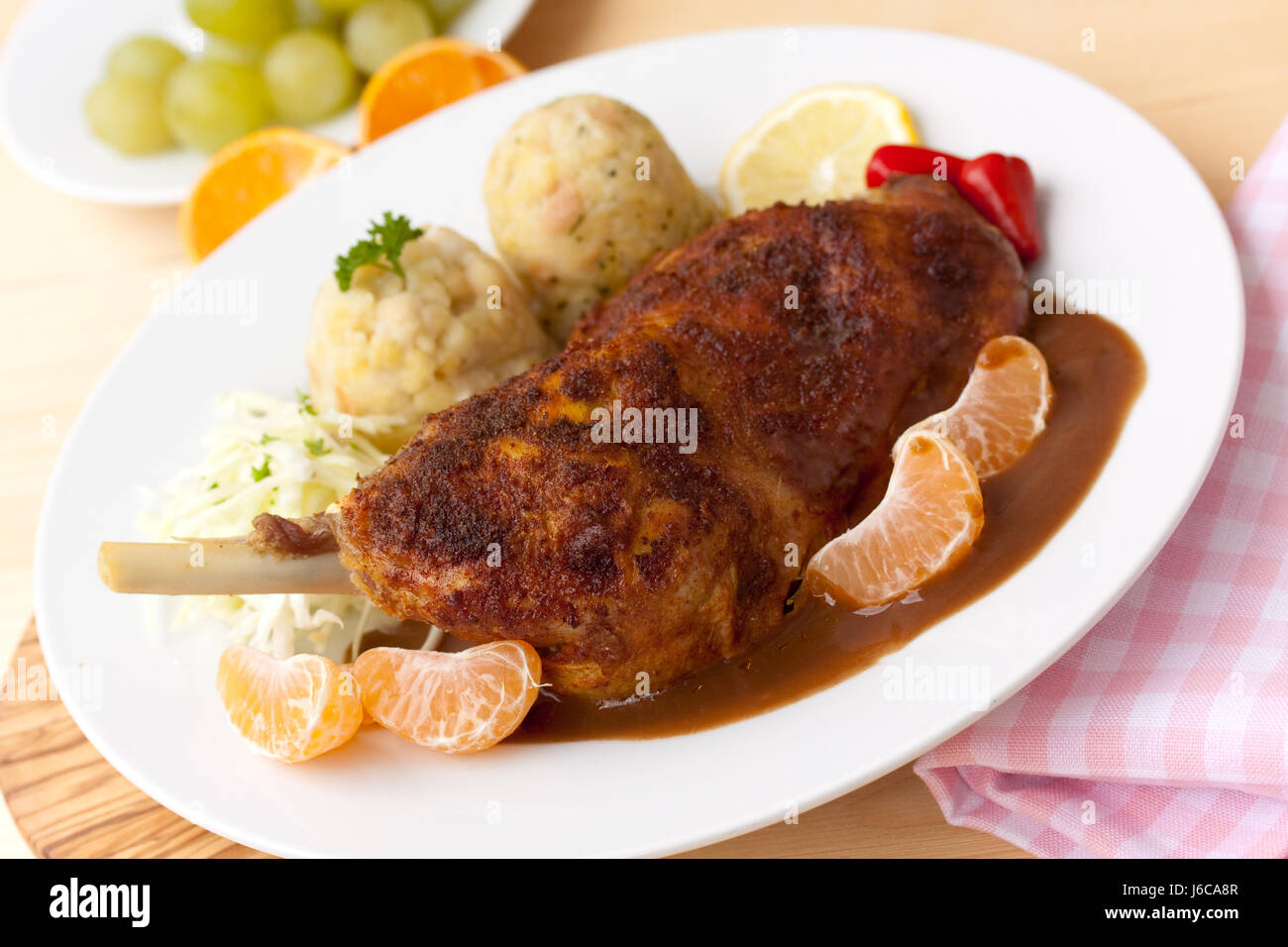 goose leg with sauce,dumplings-fried Stock Photo - Alamy