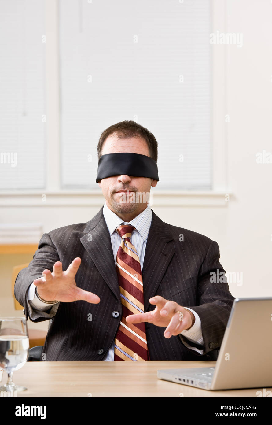 Seated man reaching hi-res stock photography and images - Alamy