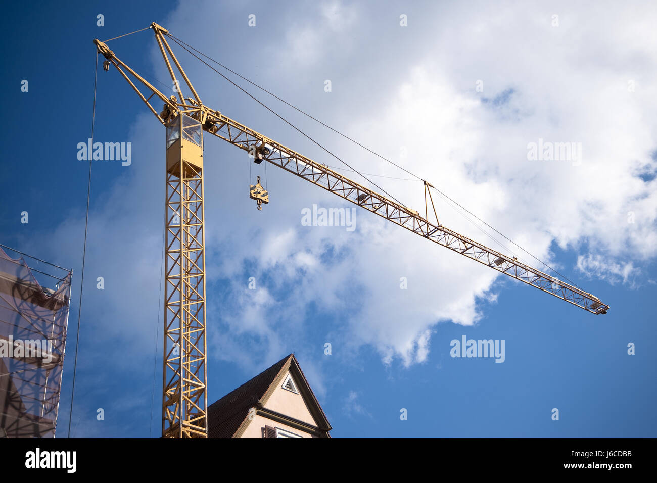 blue scaffold scaffolding house-build firmament sky rooftop yellow ...