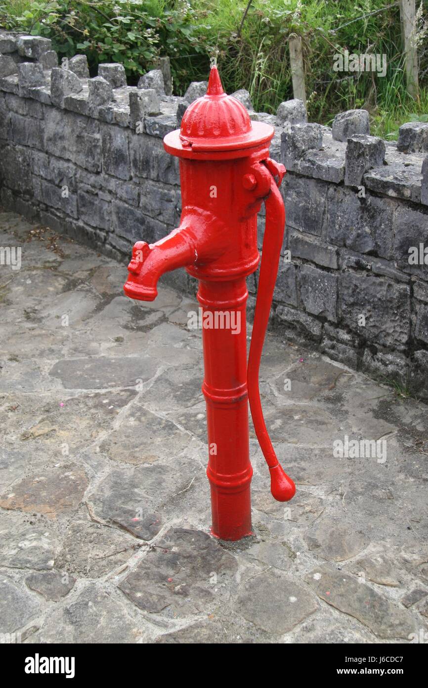 red water pump Stock Photo - Alamy