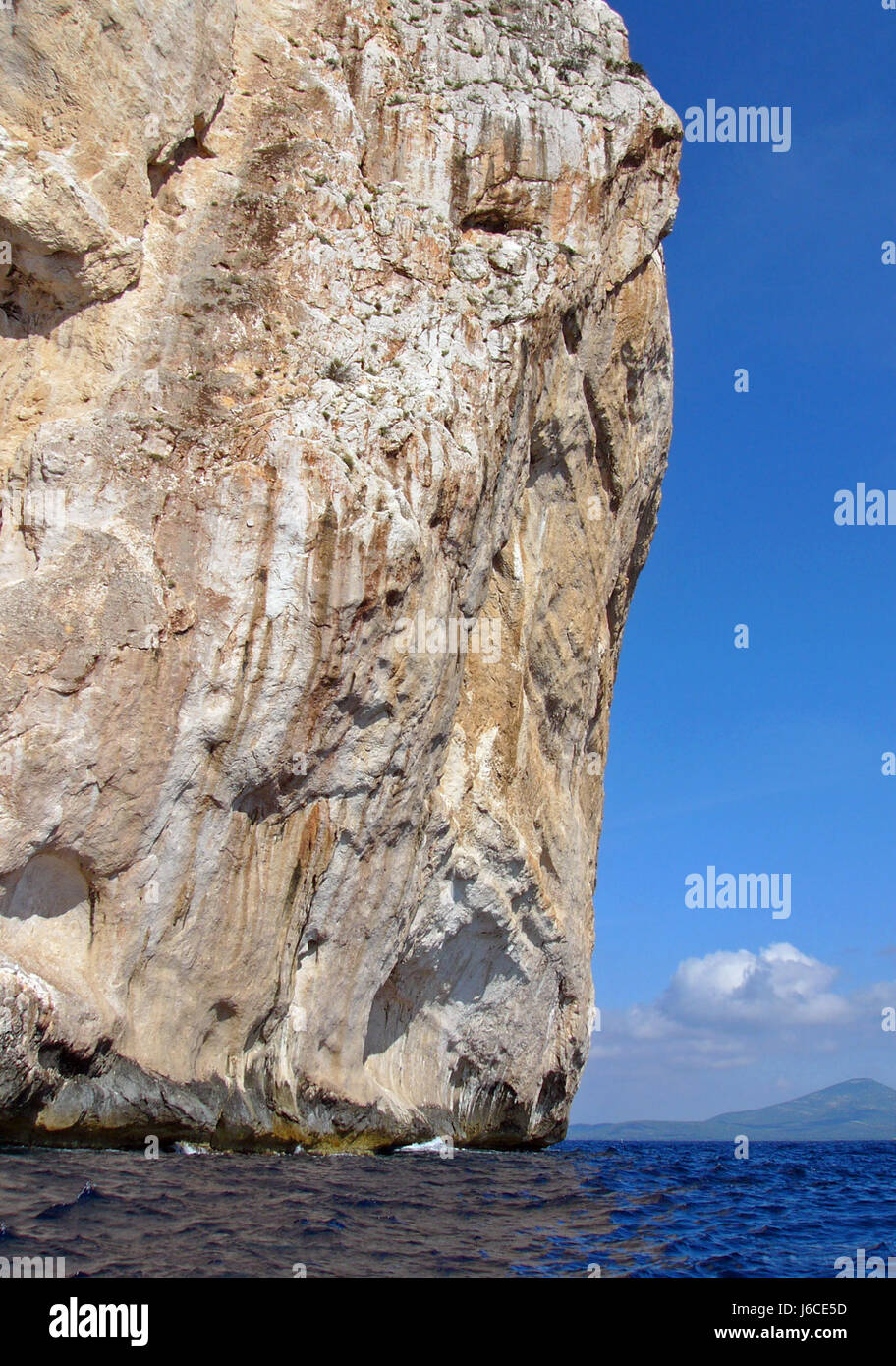 rock steep vertical high pressure area sardinia headland worms eye hill ...