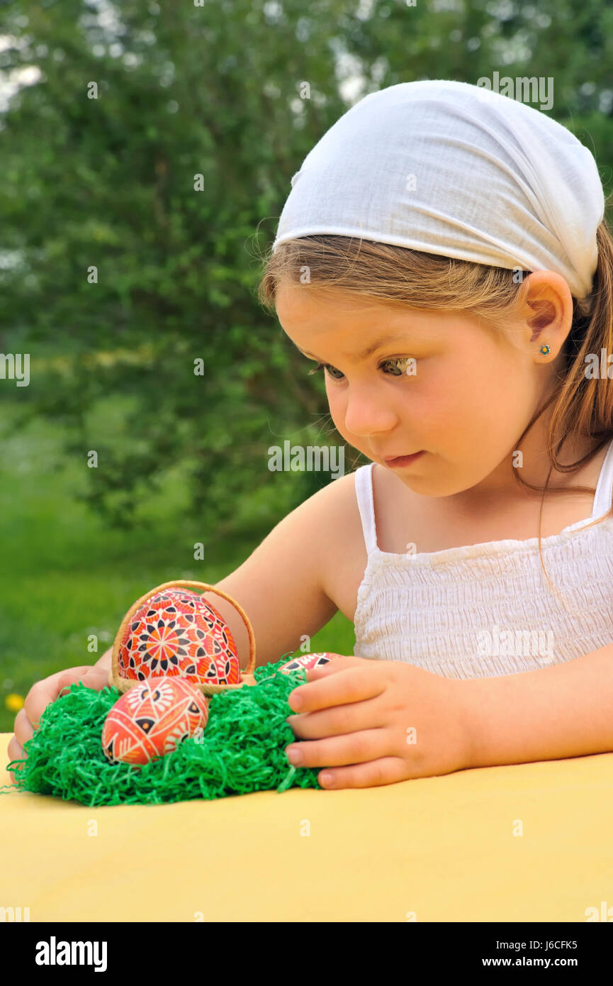 small tiny little short easter egg child girl girls humans human beings ...