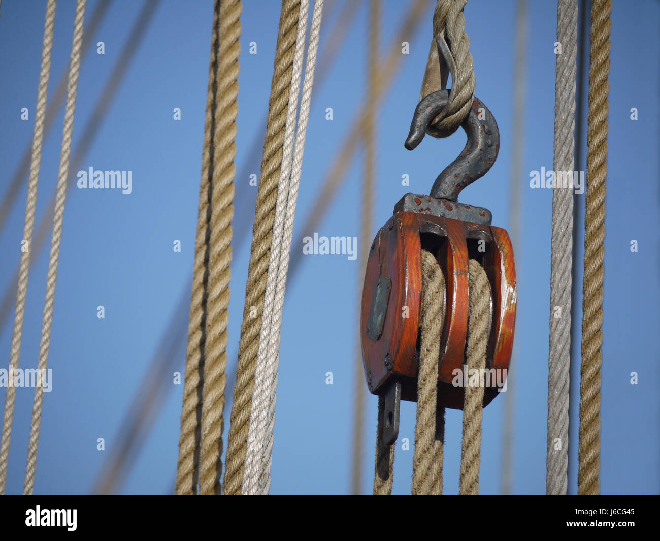 sail old-timer sailing boat sailboat sheet ropes block macro close-up ...