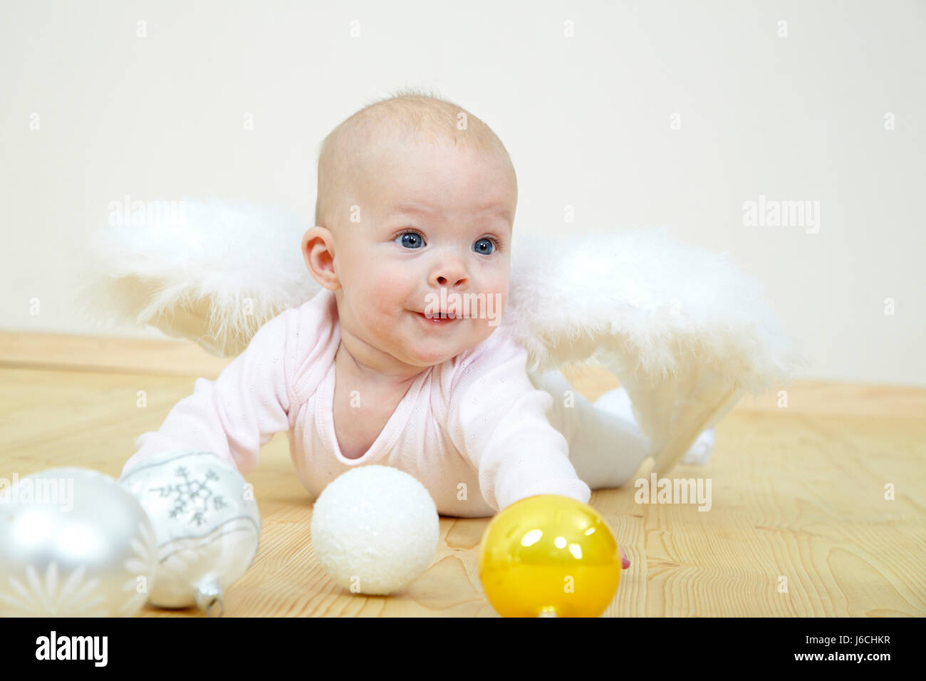 babyengerl with christbaumkugeln Stock Photo - Alamy