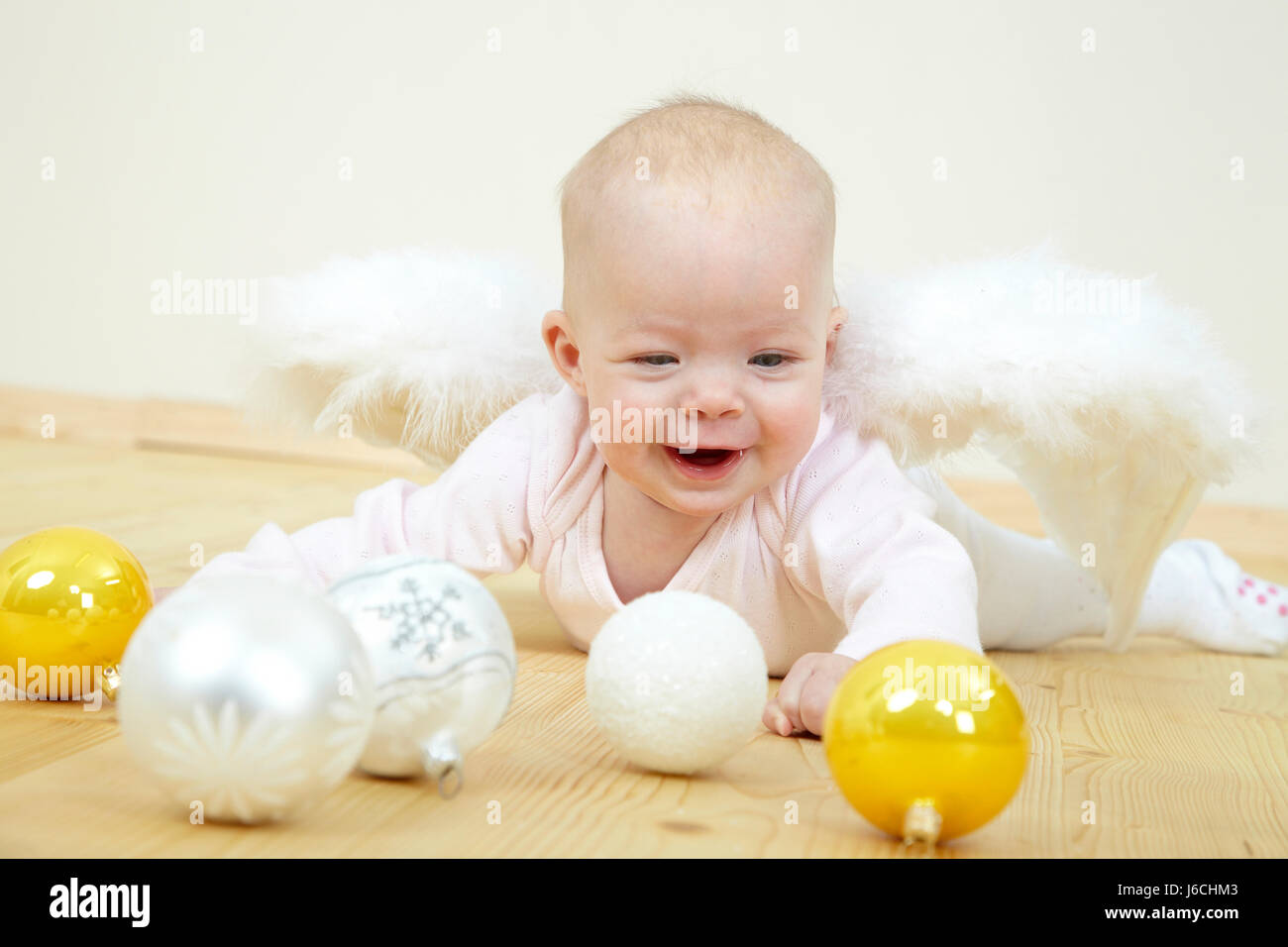 babyengerl with christbaumkugeln Stock Photo - Alamy