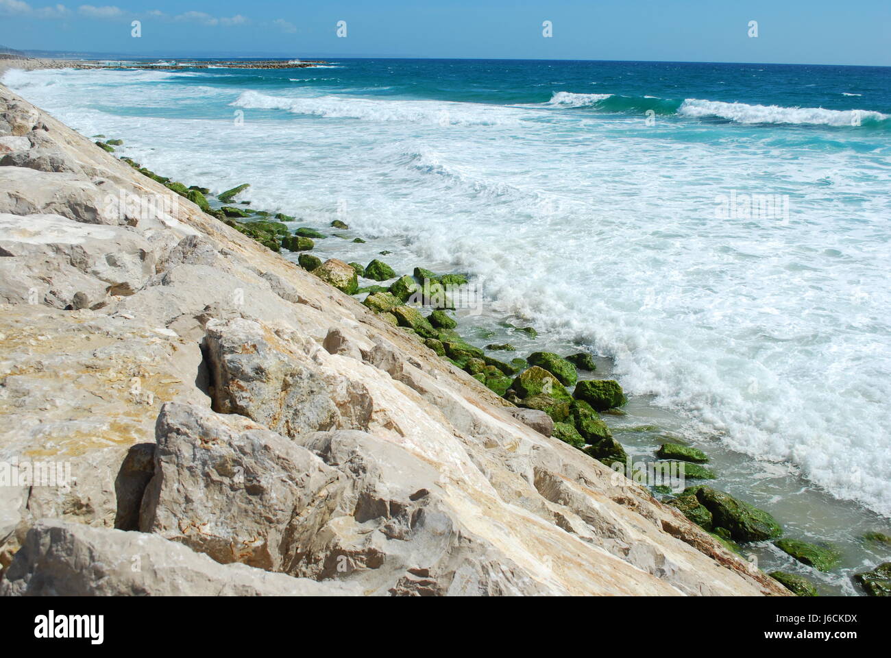 coast rocks salt water sea ocean water stones shore blue danger ...