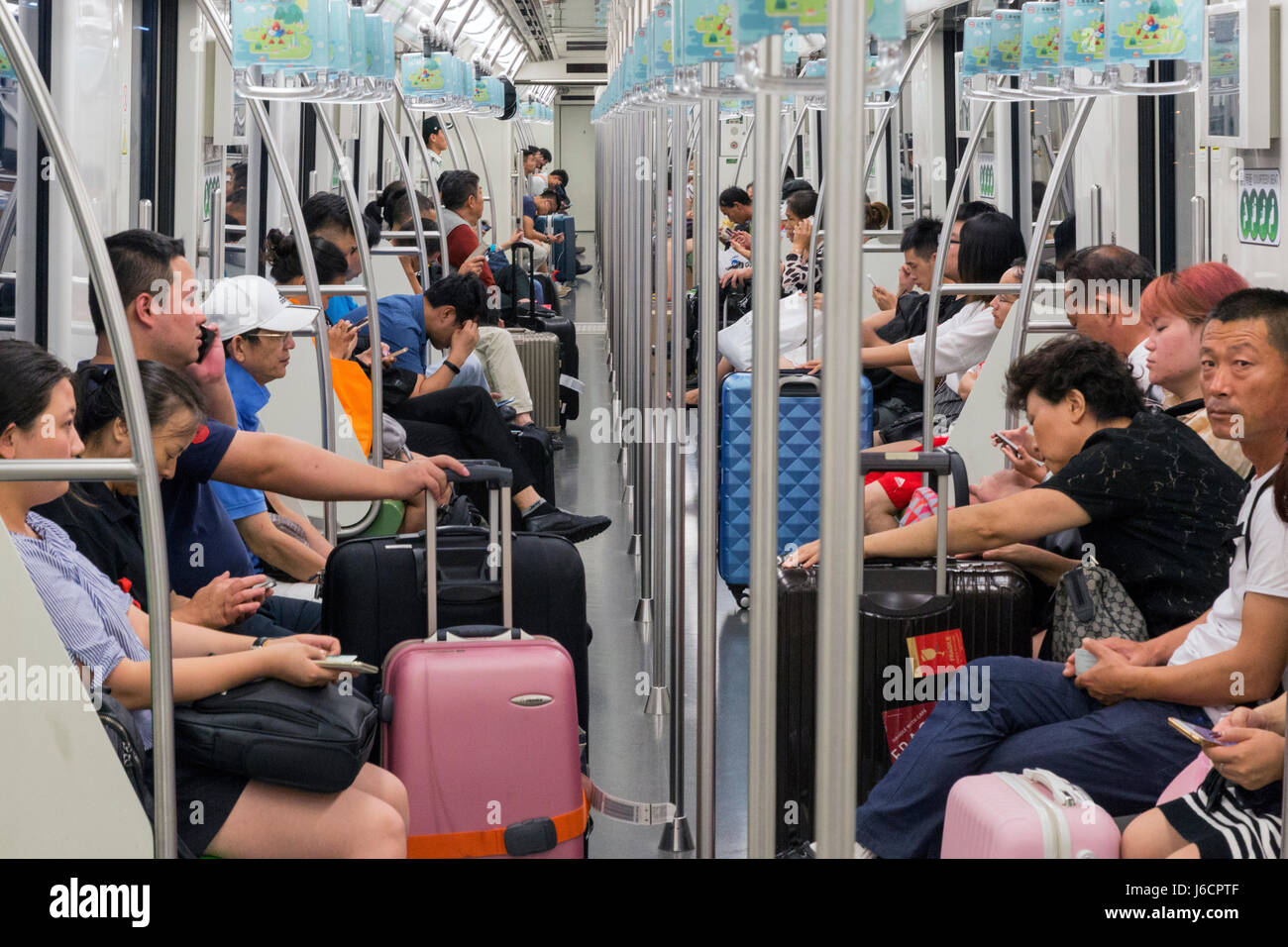 Passengers sleeping on train hi-res stock photography and images - Alamy