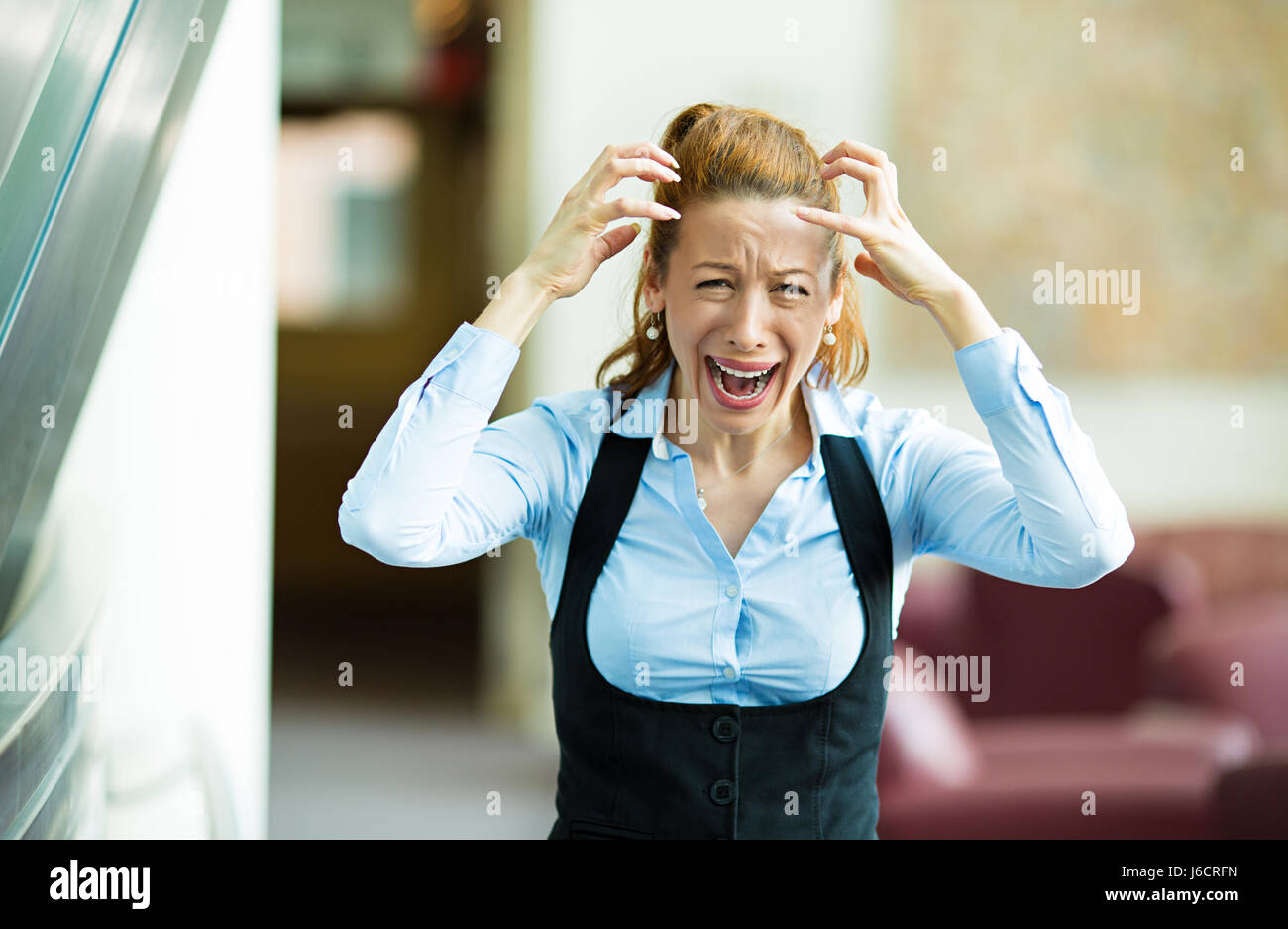 Closeup portrait mad, angry, upset stressed young businesswoman, worker ...