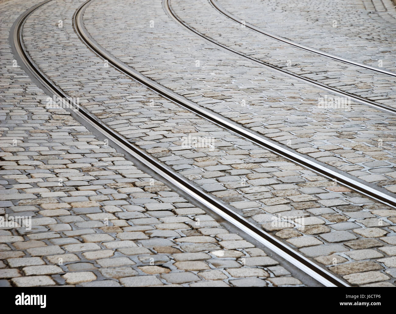 rail track cobblestone curve street road detail traffic transportation ...
