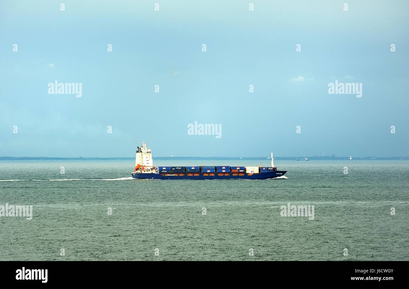 Cargo ship sailing in the Straits of Malacca Stock Photo - Alamy