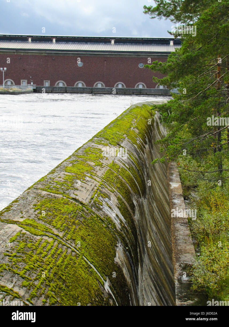 a small causeway on the river with rocky shores Stock Photo - Alamy