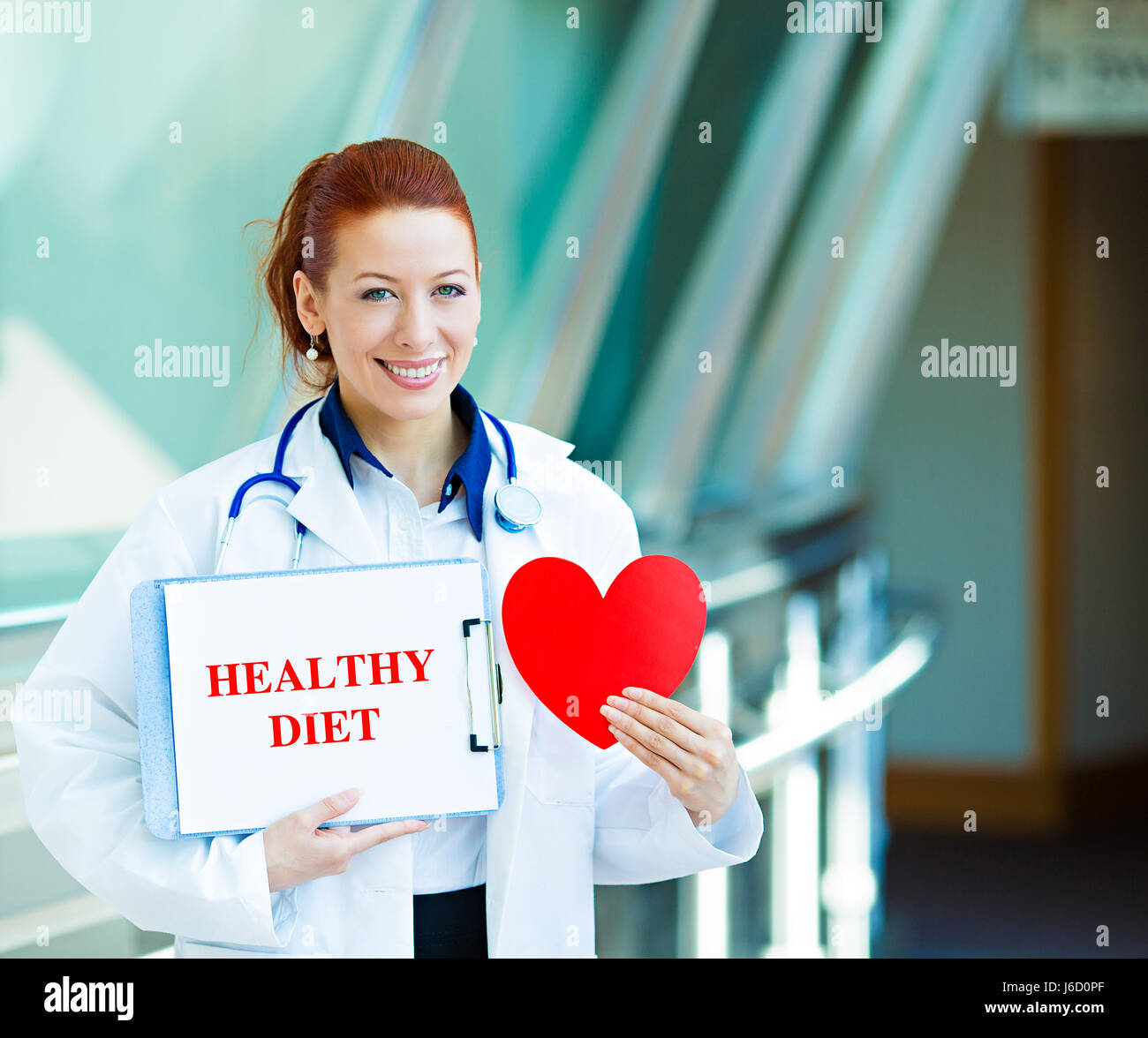 Closeup portrait happy smiling female health care professional, woman ...
