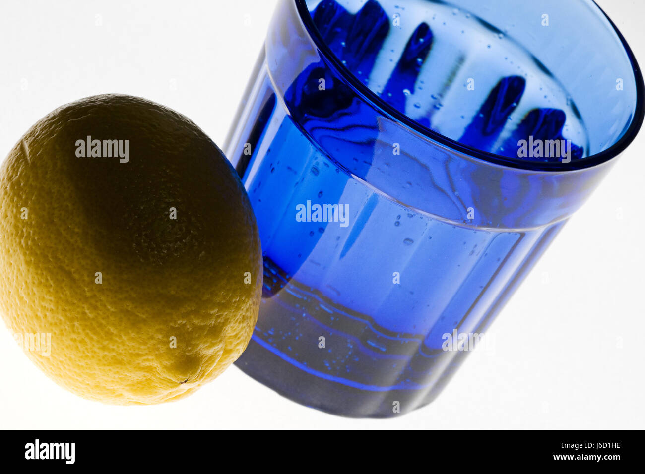 lemon with glass Stock Photo - Alamy