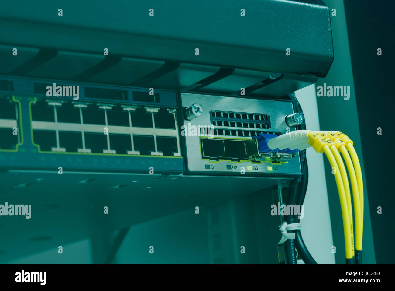 Network switch with fiber optic connecting Stock Photo - Alamy