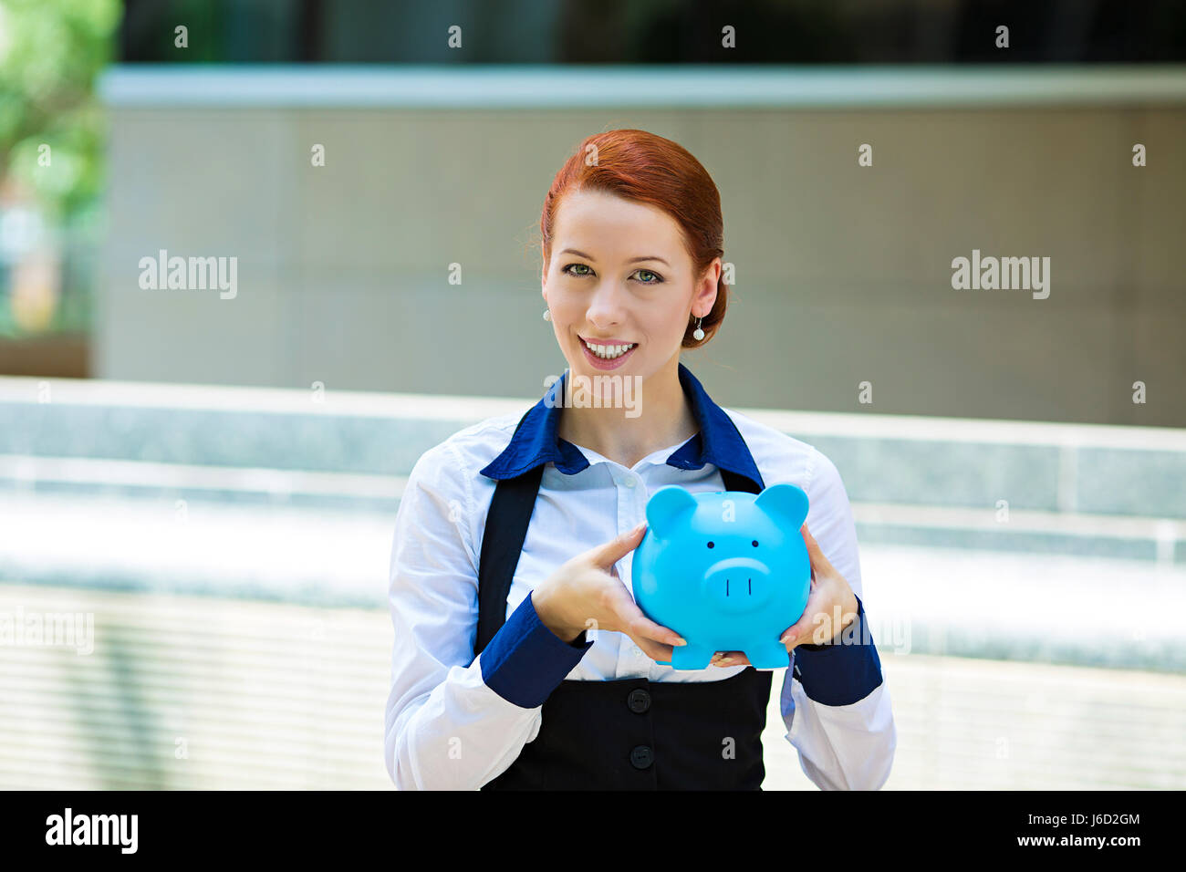 Closeup portrait happy, smiling business woman, bank employee holding ...