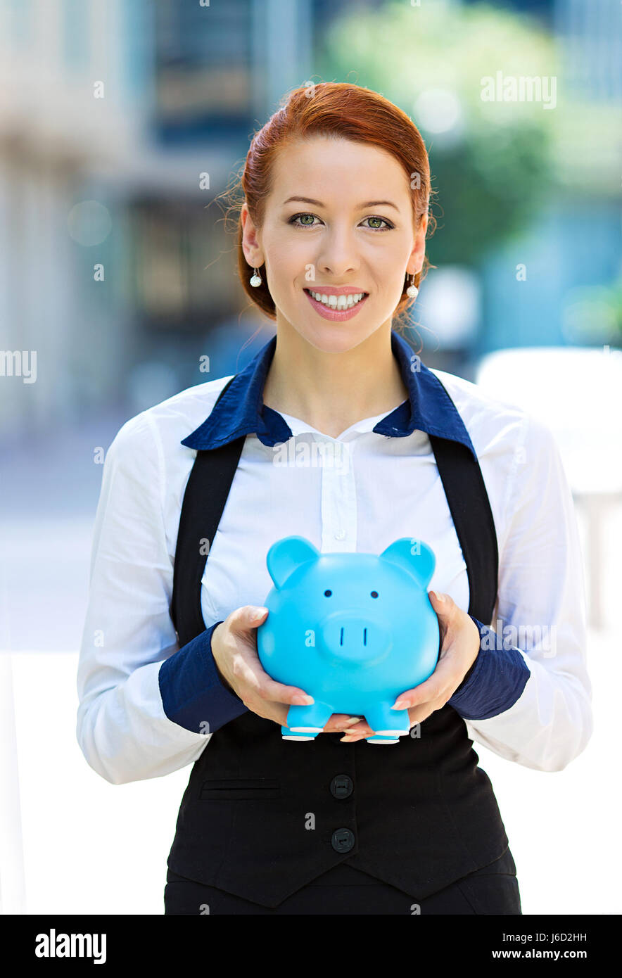 Closeup portrait happy, smiling business woman, bank employee holding ...