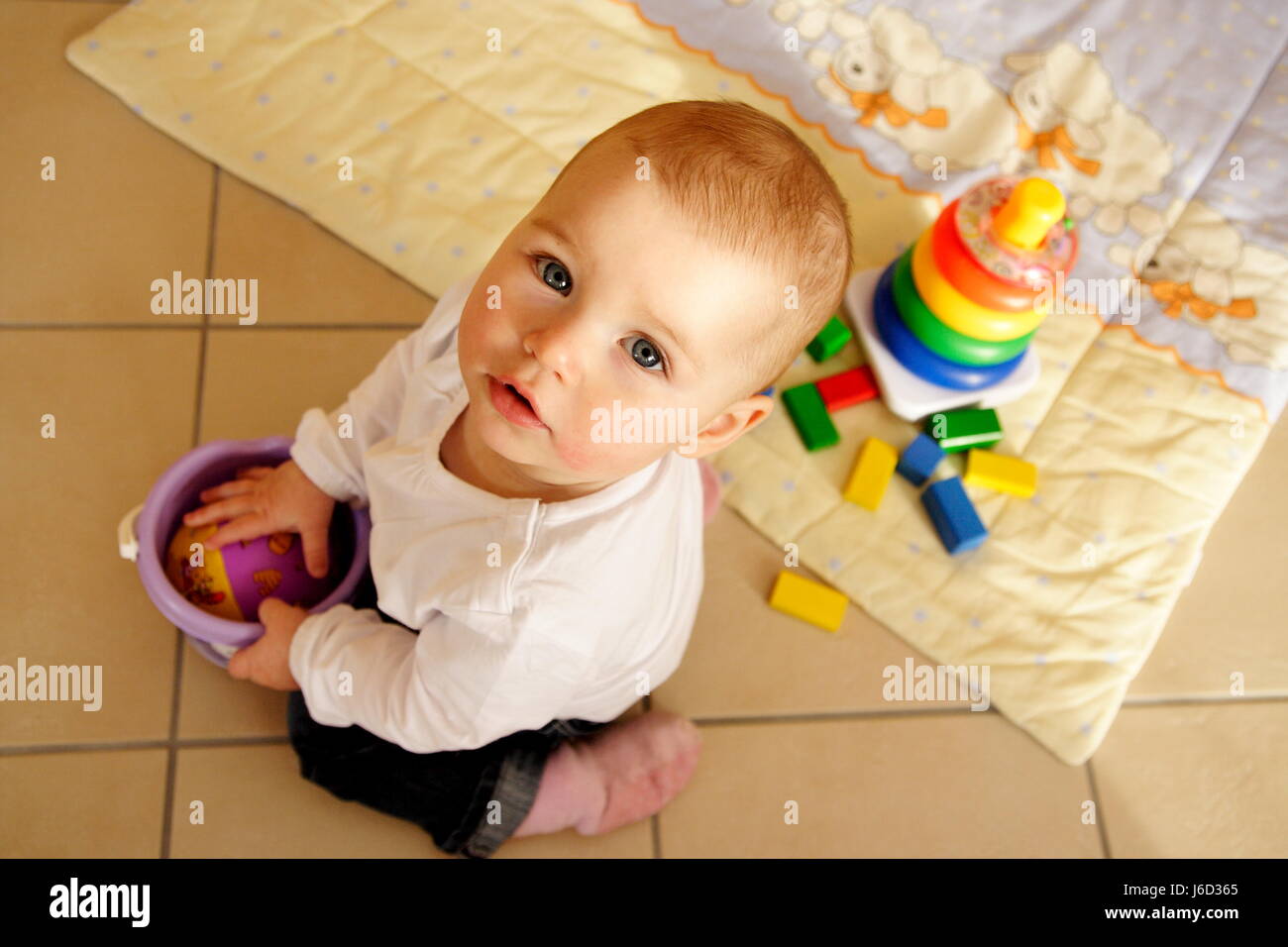 baby playing at home in the living room Stock Photo - Alamy