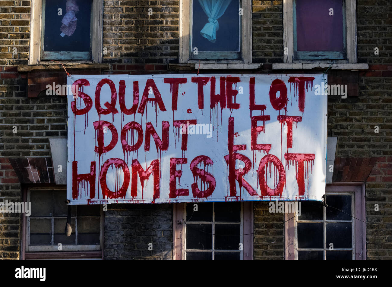 Squatting banner on empty building in Greenwich, London, England ...