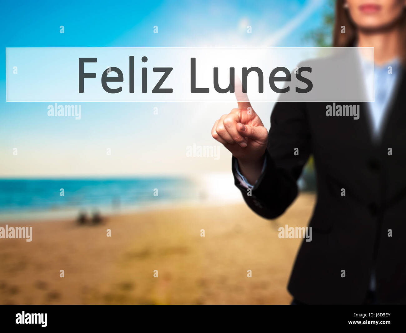 Feliz Lunes (Happy Monday In Spanish) - Businesswoman hand pressing ...