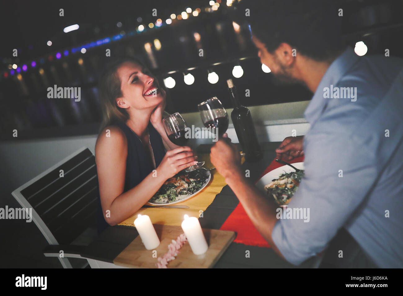 Candlelight dinner couple romantic hi-res stock photography and images ...