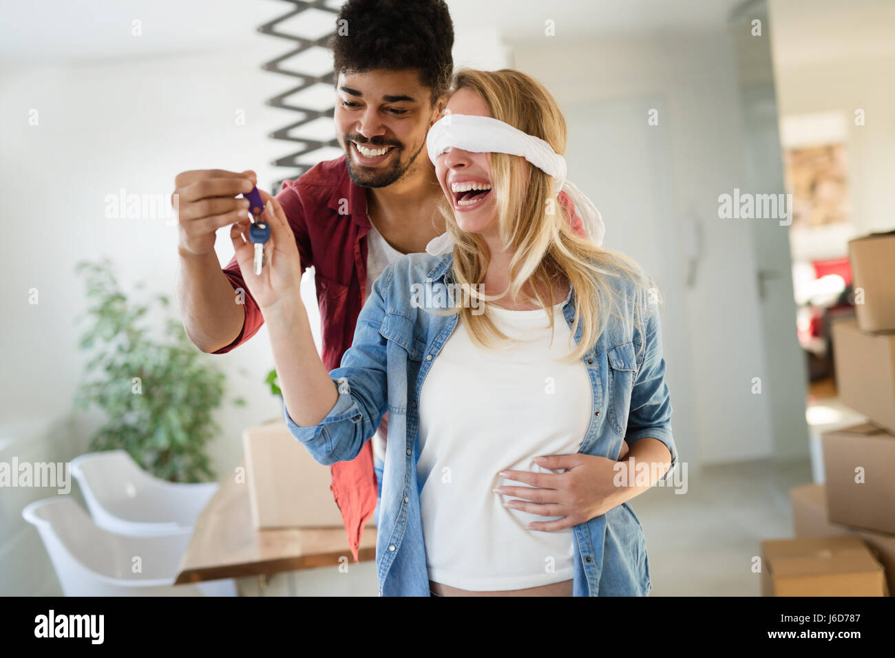 home, people, moving and real estate concept - couple in love moving in ...