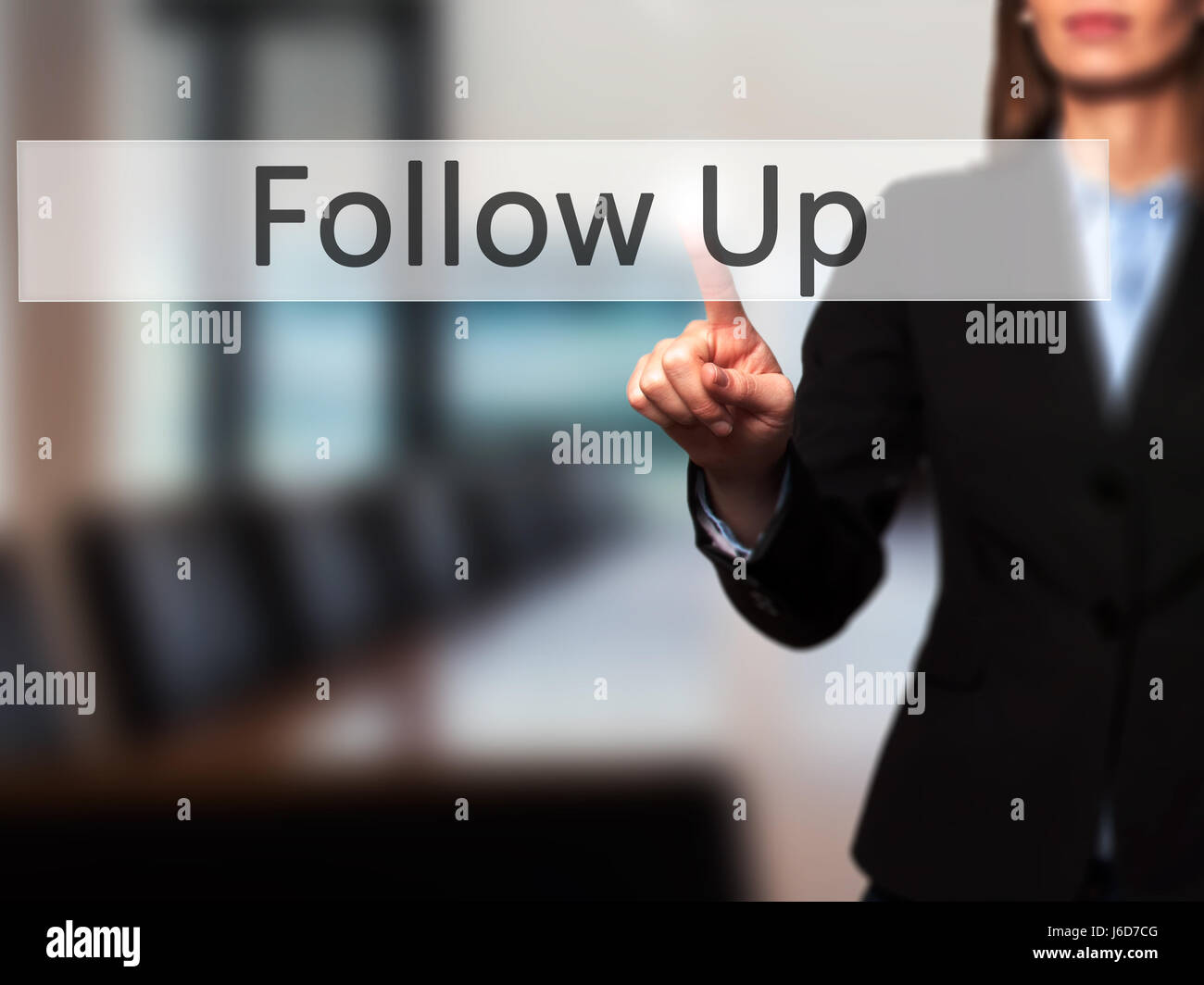 Follow Up - Businesswoman hand pressing button on touch screen ...