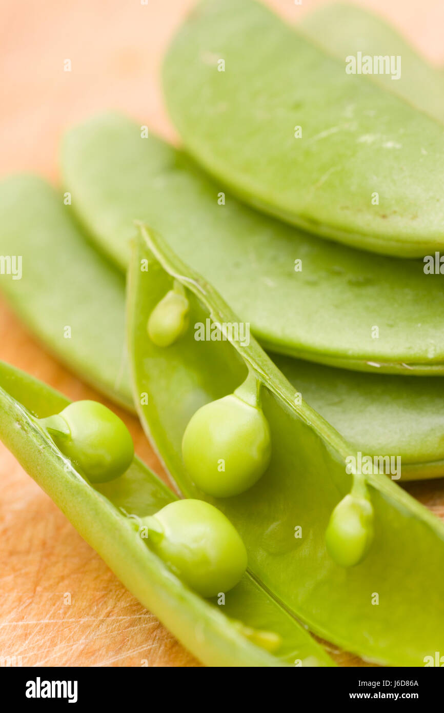 green vegetable peas pod wooden backdrop background healthy food ...
