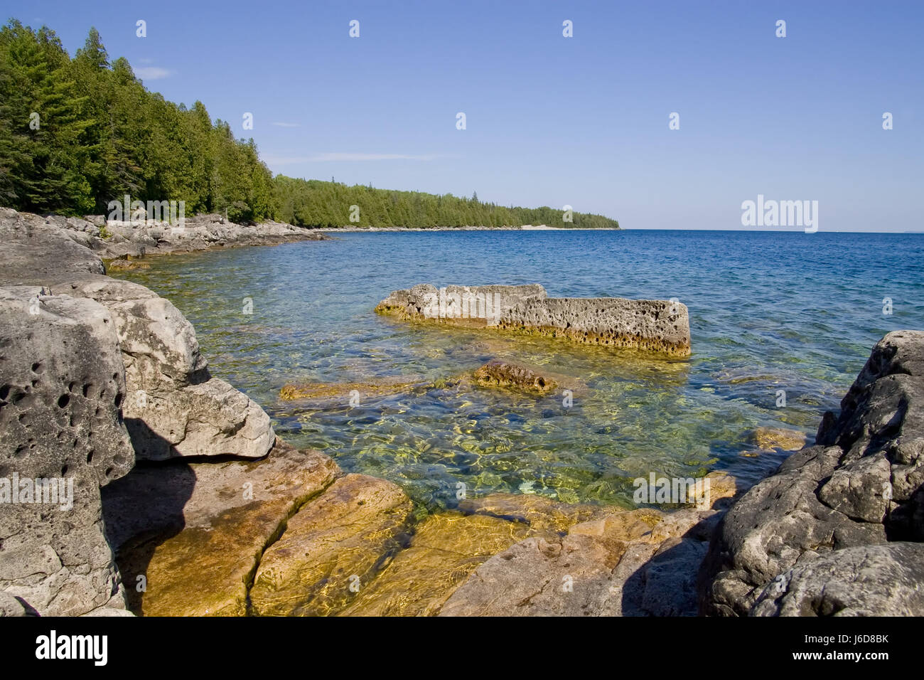 coast rocky water blue big large enormous extreme powerful imposing ...