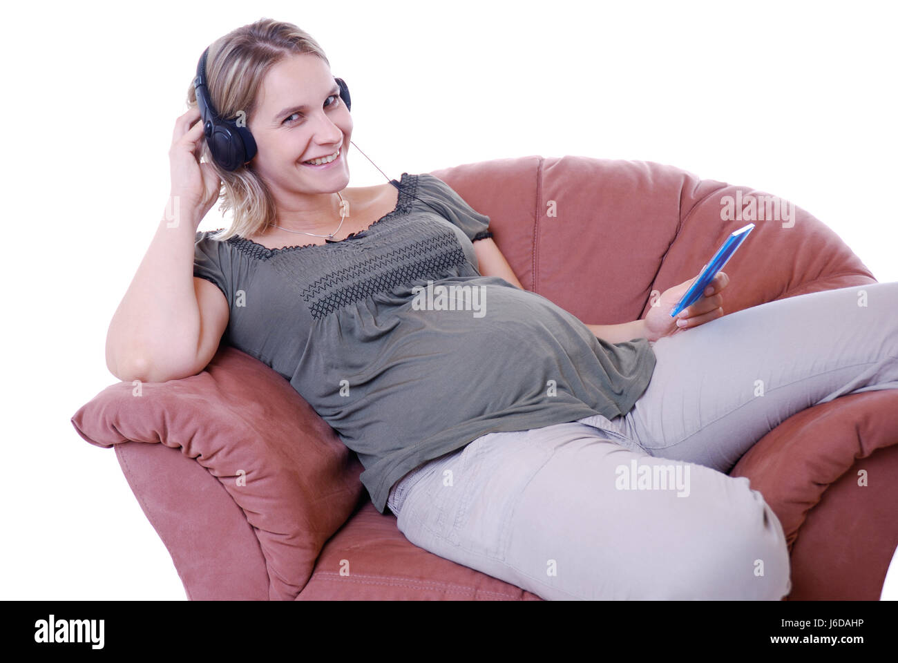pregnant listen music Stock Photo - Alamy