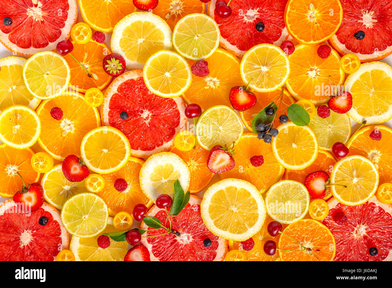 top view of beautiful fresh trendy seamless pattern sliced mixed citrus ...