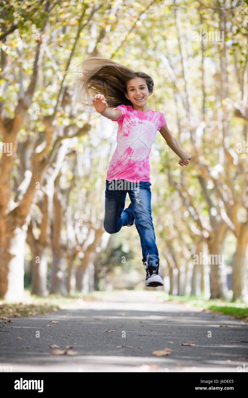 female spring bouncing bounces hop skipping frisks jumping jump ...