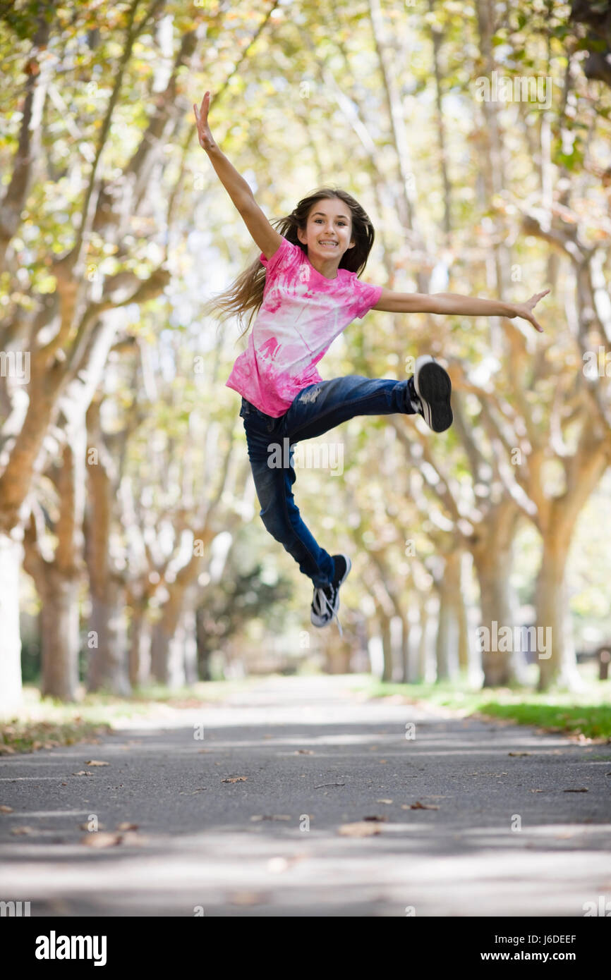 female spring bouncing bounces hop skipping frisks jumping jump ...