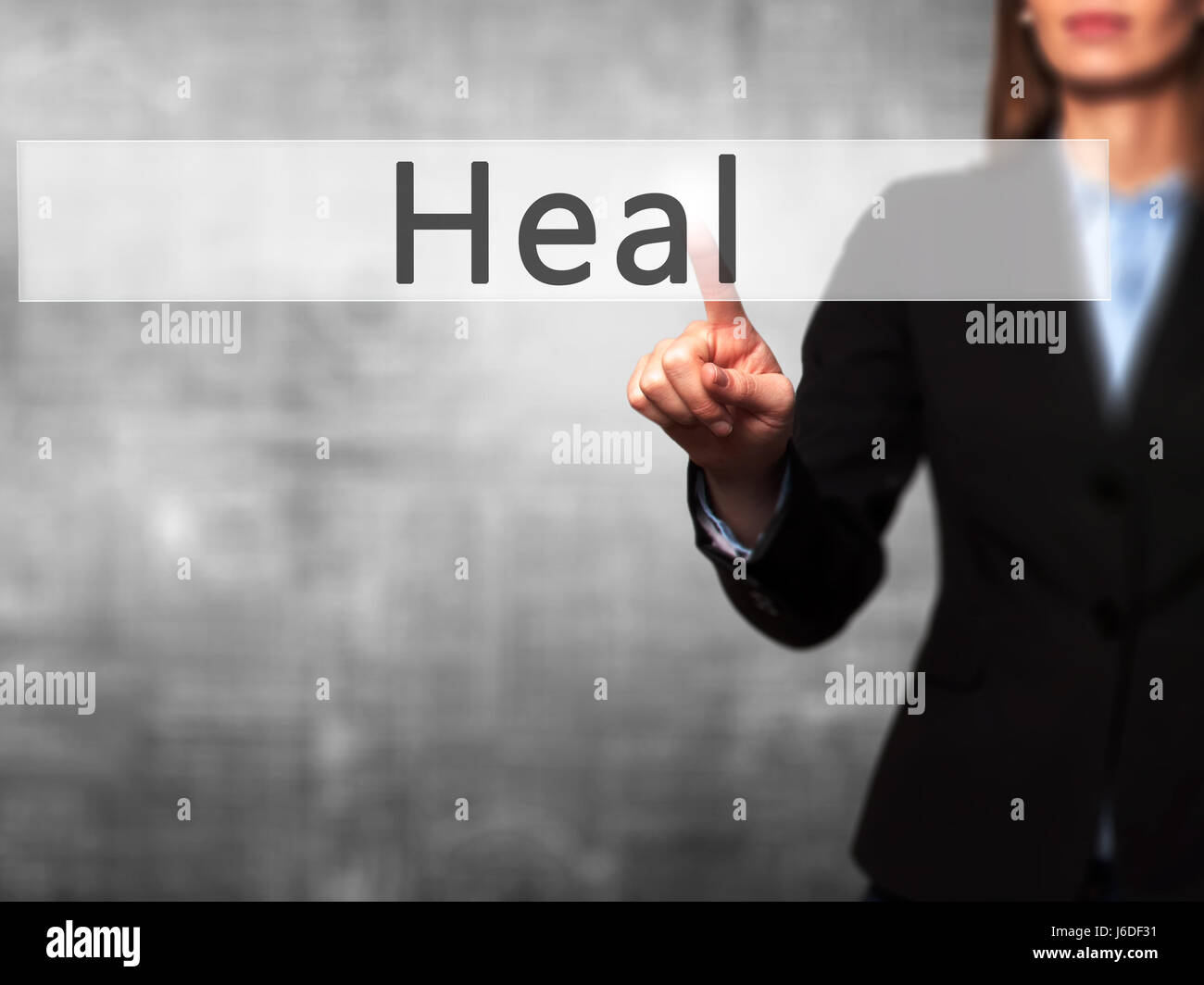 Heal - Businesswoman hand pressing button on touch screen interface ...