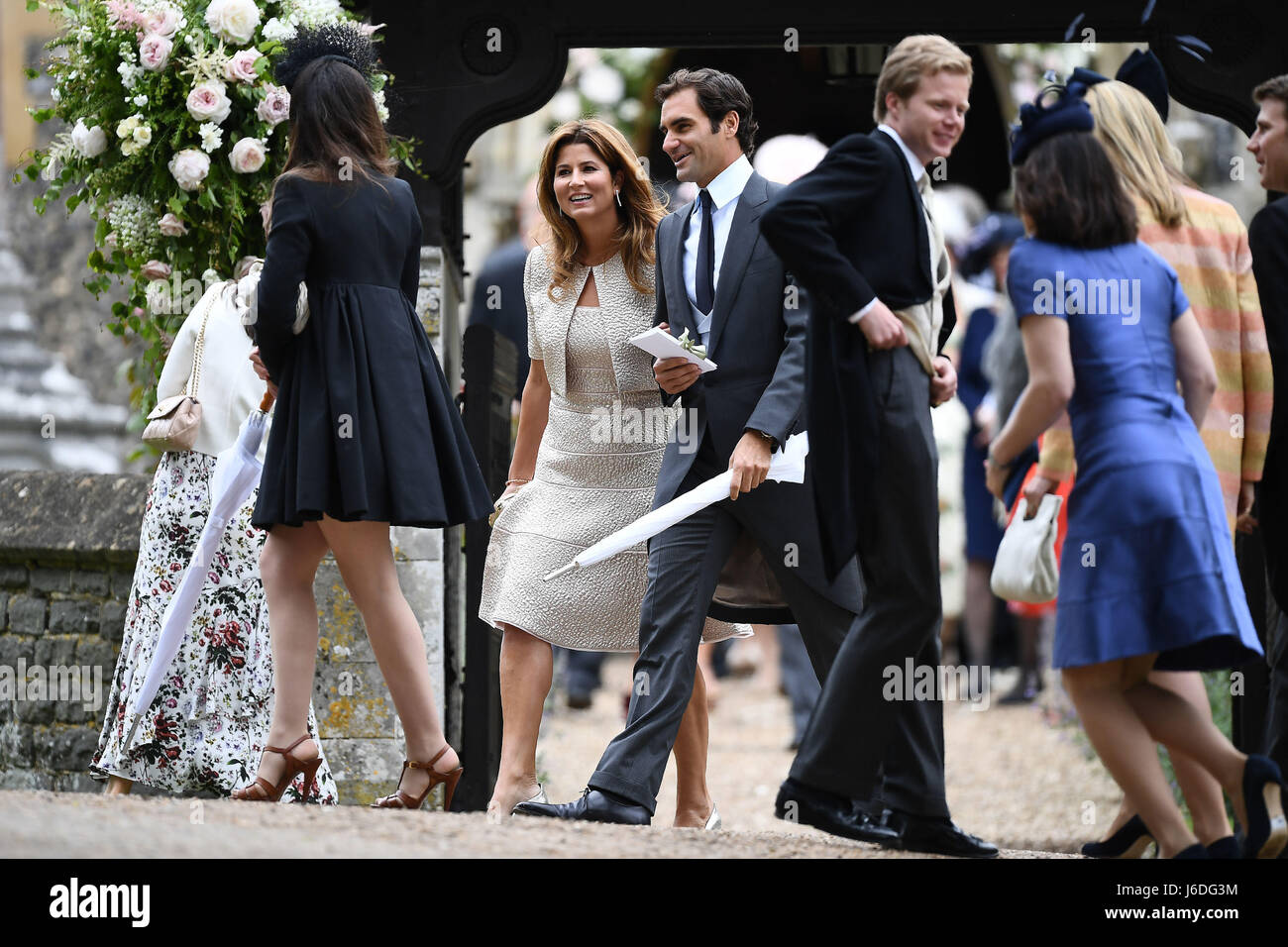 Roger Federer and his wife Mirka leave St Mark's church in Englefield ...