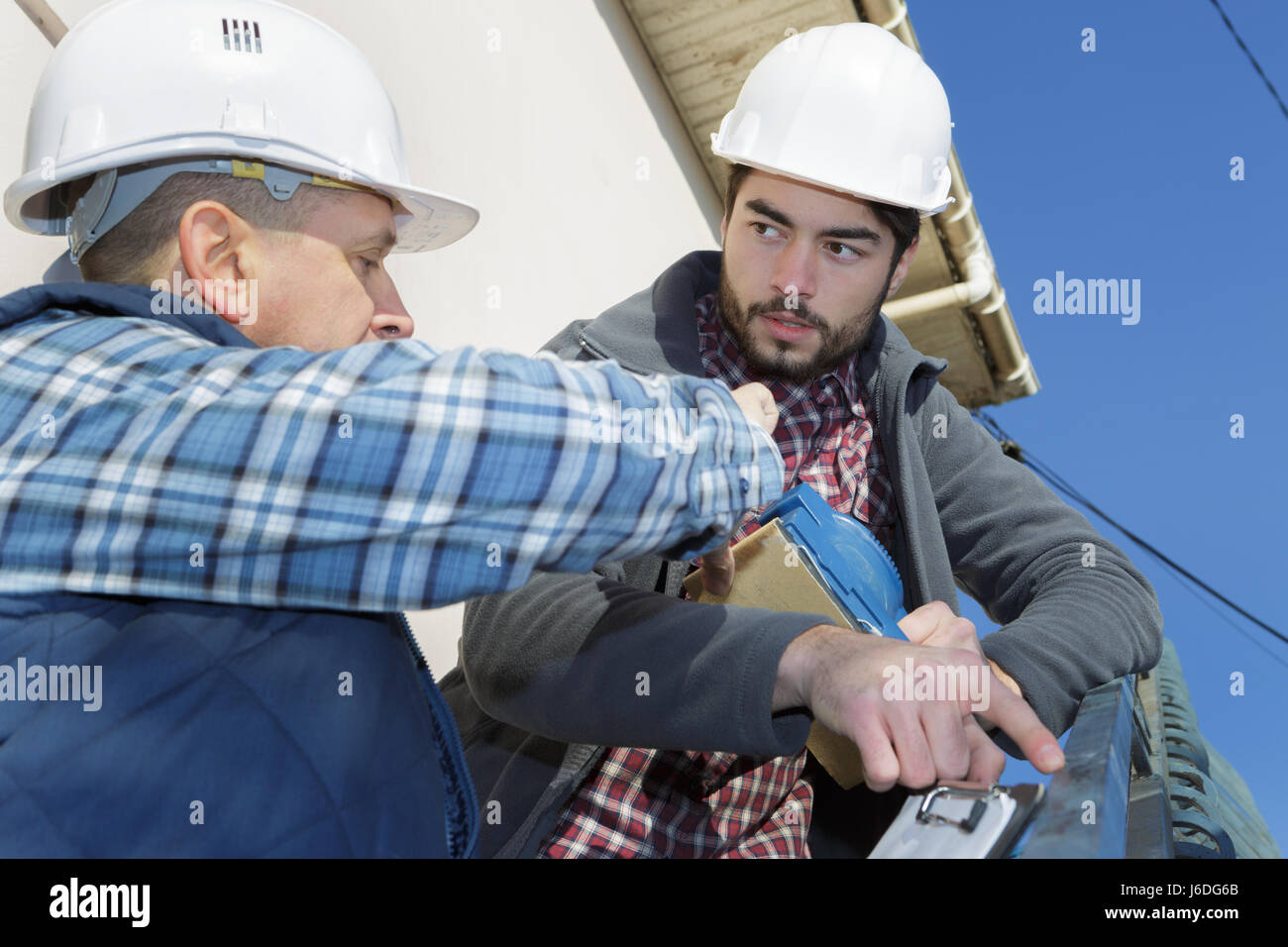 Team male builders showing hi-res stock photography and images - Alamy