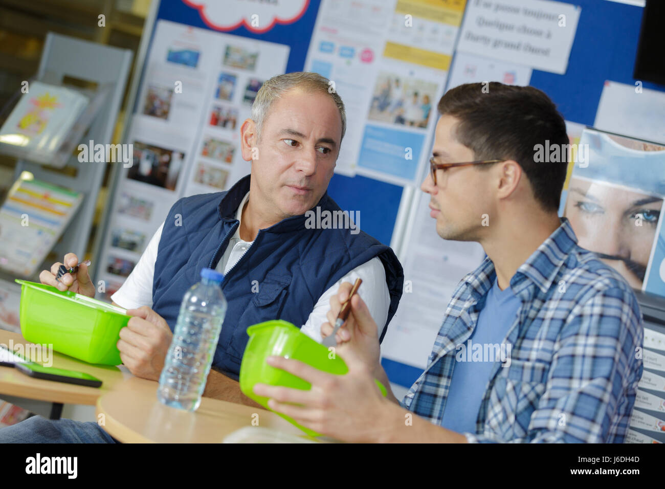 Men eat from bowls hi-res stock photography and images - Alamy