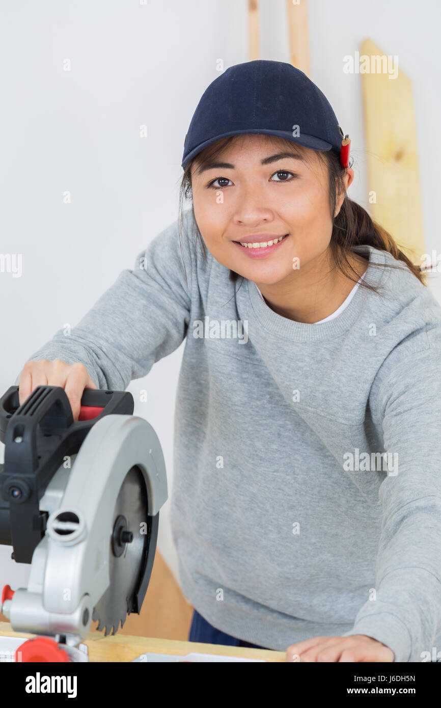 Female carpenter using bench hi-res stock photography and images - Alamy