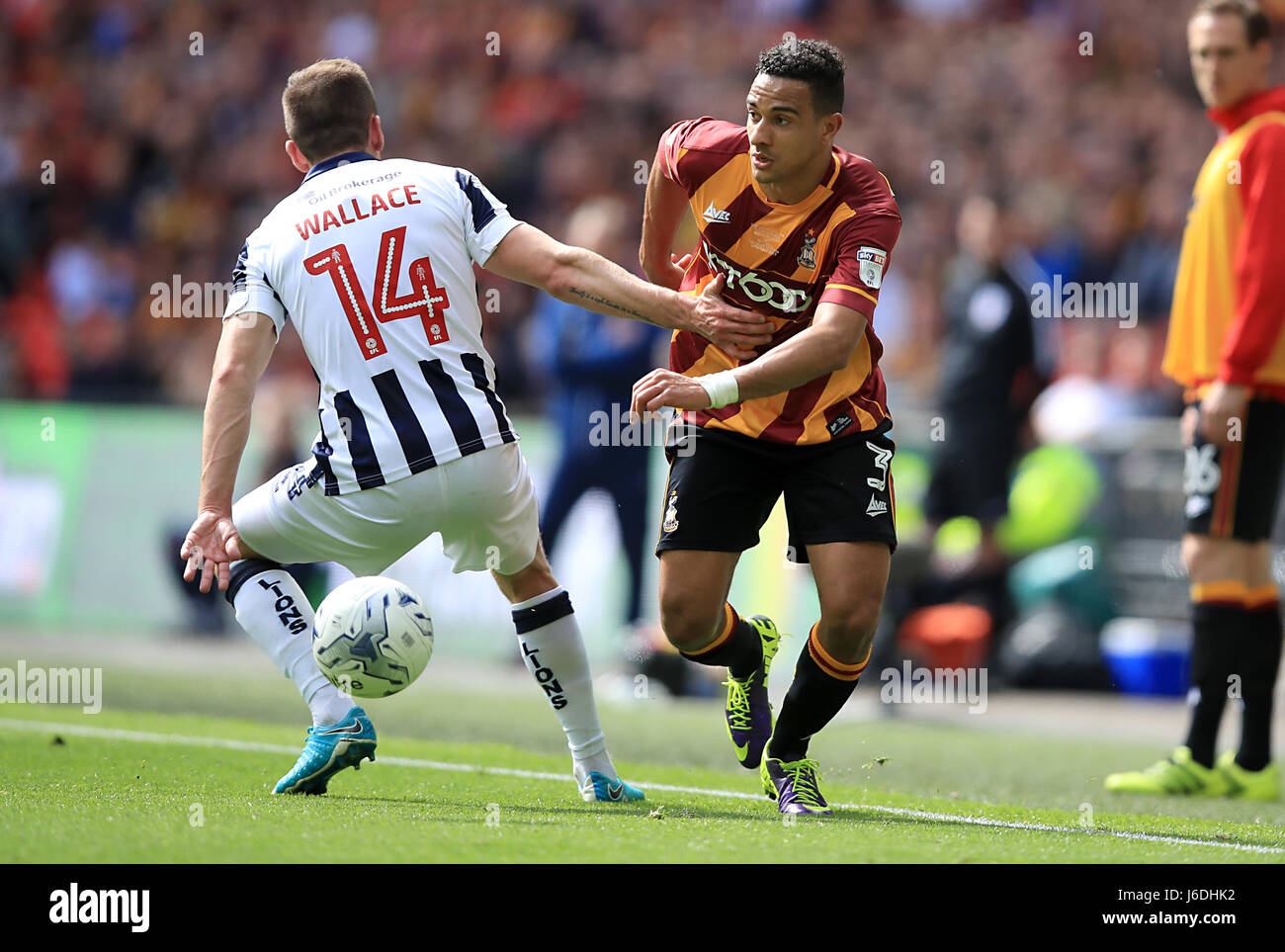 Millwall's Jed Wallace (left) and Bradford City's James Meredith battle ...